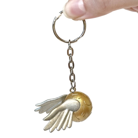 Warner Bros. | Accessories | Harry Potter Flying Golden Snitch Metal ...